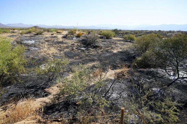 Over 1,000 people remain evacuated as crews dig containment line around ...