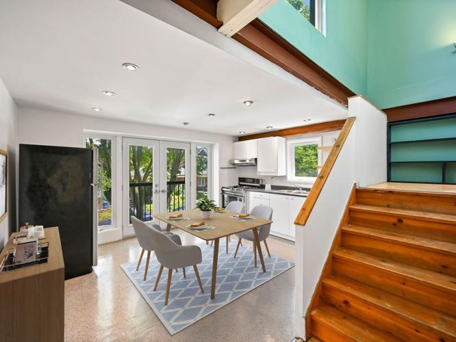Inside this $980K ‘true hard loft’ townhouse in Toronto