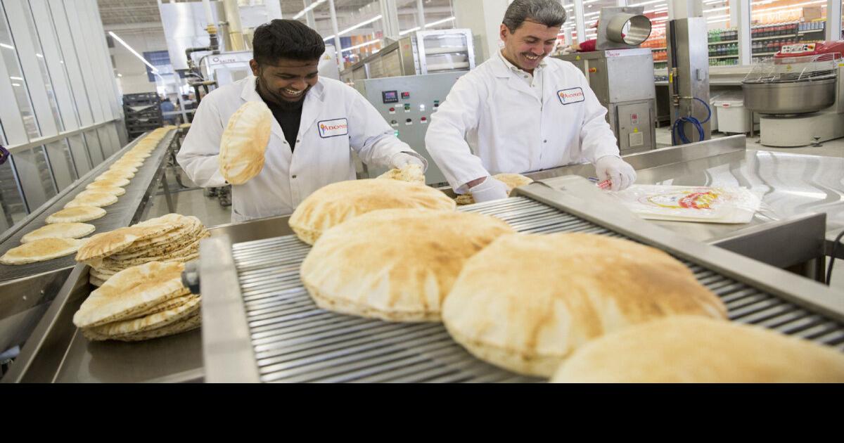 Pita-making machine wows shoppers at Marche Adonis Middle Eastern grocery