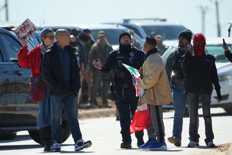 Officers confront protesters at Texas facility as lawmaker visits ...
