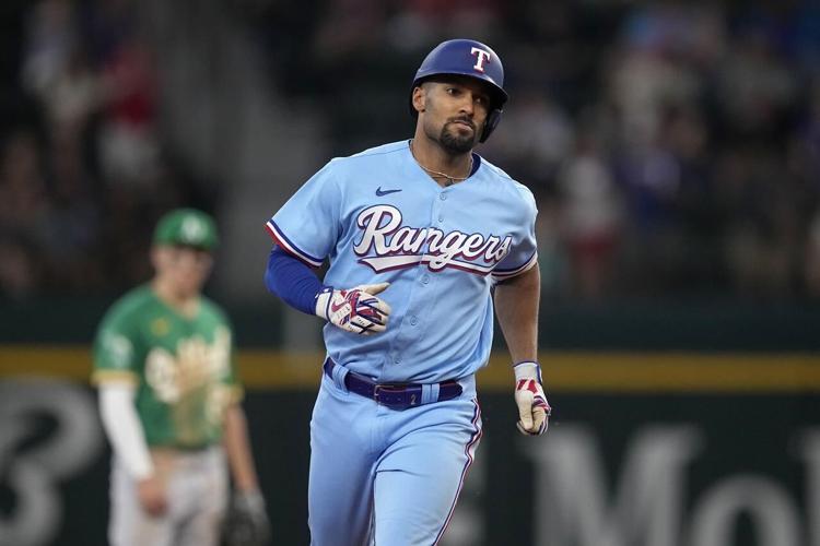 Semien has another 2-HR, 4-hit game as Rangers beat A's 9-4 for 1st ...