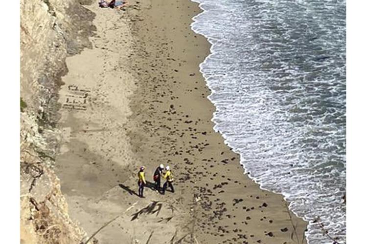 Kite surfer rescued from remote California beach after making 'HELP ...