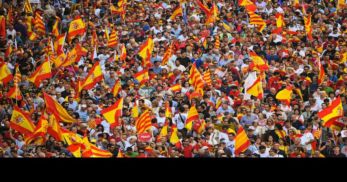 Hundreds of thousands rally against Catalonia’s secession from Spain