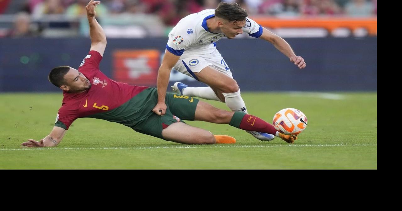 Bayern signs Portugal left back Raphaël Guerreiro on a free transfer ...
