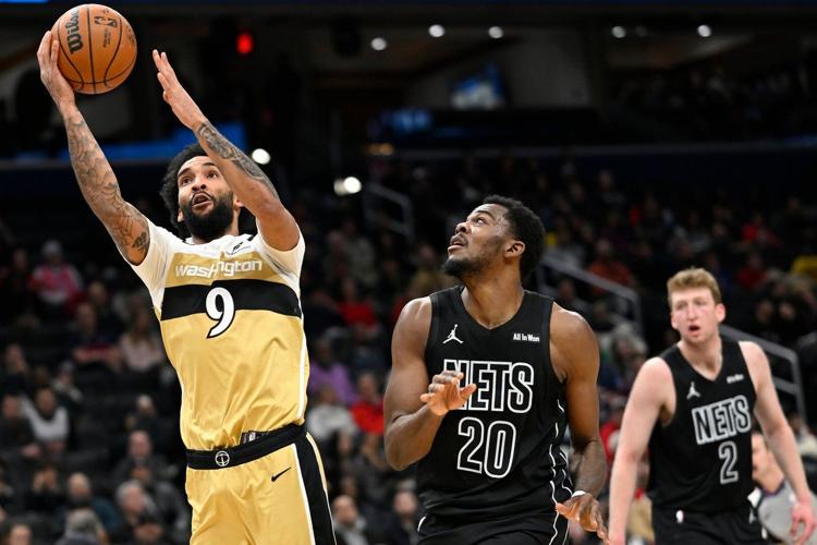 Champagnie scores season-high 20 points to lead the Wizards to a 119-99 ...