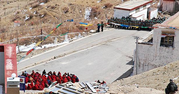 Beijing admits riots spread to provinces, arrests made