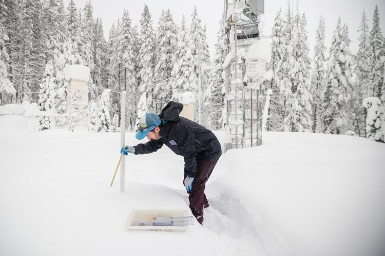 California walloped by winter storm with high winds and heavy rain and snow