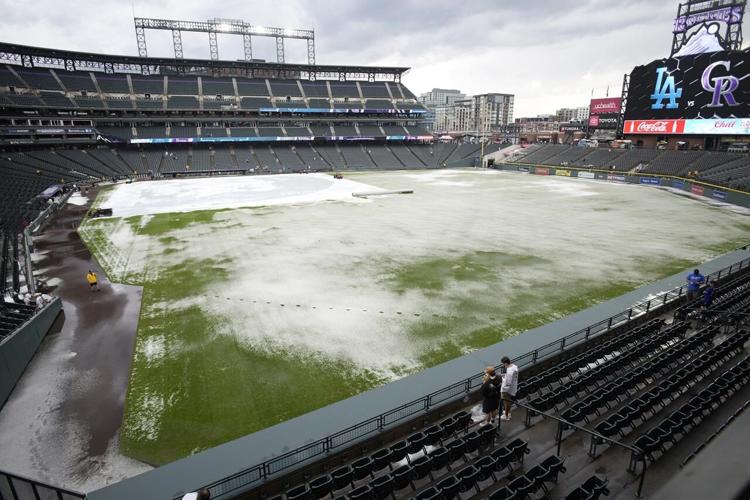 All Hail the Rockies! Pea-sized hail makes Coors Field a winter ...
