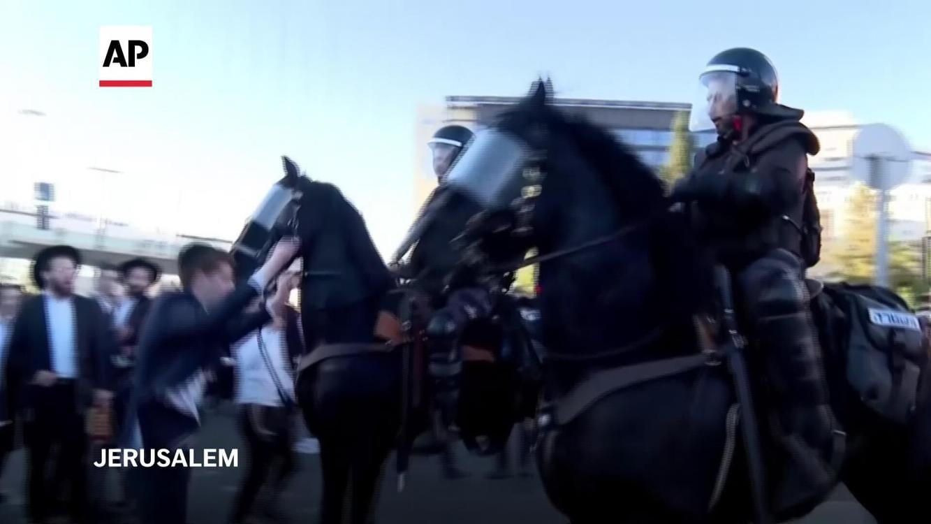 Ultra-Orthodox protesters block roads and trains across Israel over ...