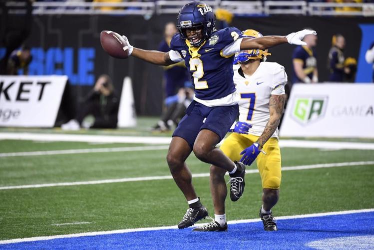 Tucker Gleason runs and passes for 5 OT scores as Toledo beats Pitt 48 ...