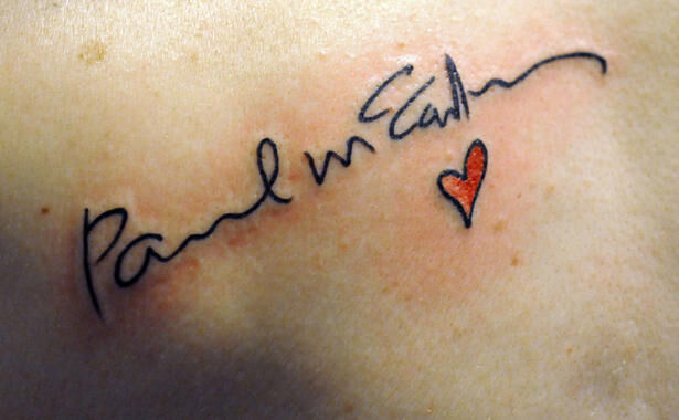 Woman turns Paul McCartney’s autograph into a tattoo