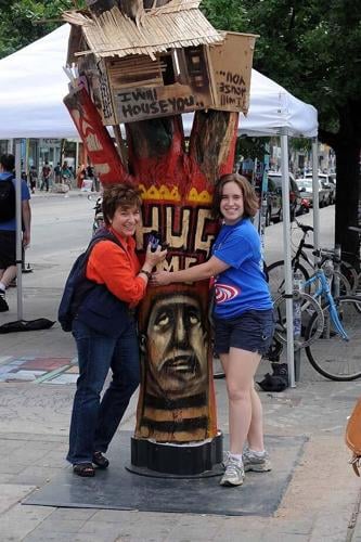 The Hug Me tree returns to its roots