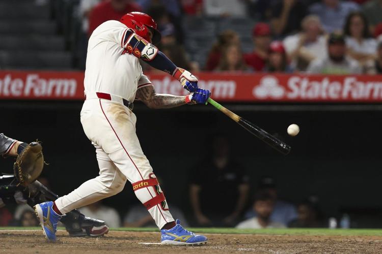 Kyle Hendricks throws 7 shutout innings and Angels score 12 two-out ...