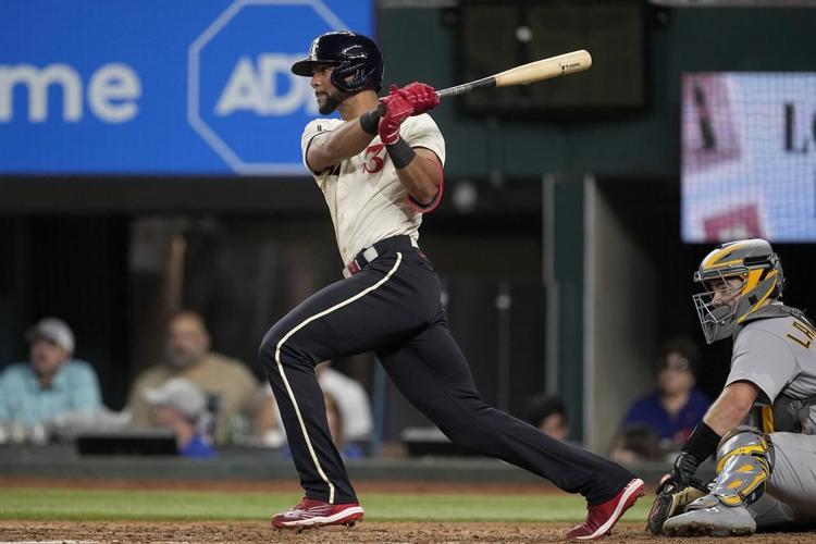 Rangers score go-ahead run on wild pitch to beat A's 3-2; only their ...