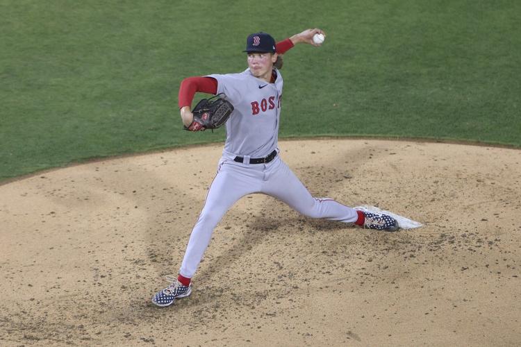 Early strikes out 11, tying Red Sox record for debut, as Boston tops A's 6-0 to close on Yankees