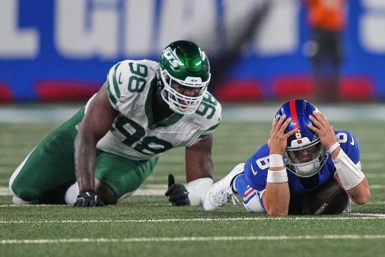 Jets make trade for Phillips official and place Weaver on season-ending ...