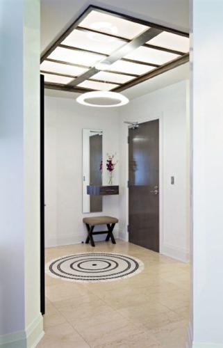 Designer establishes flow of space to conquer awkward floor plan