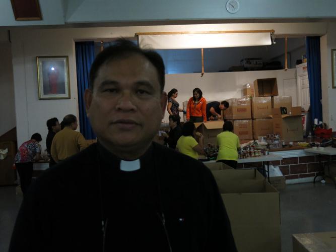 Priest keeps faith with Toronto parish praying for Philippines family