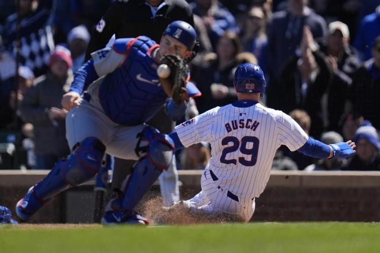 Michael Busch homers for Chicago Cubs against former team