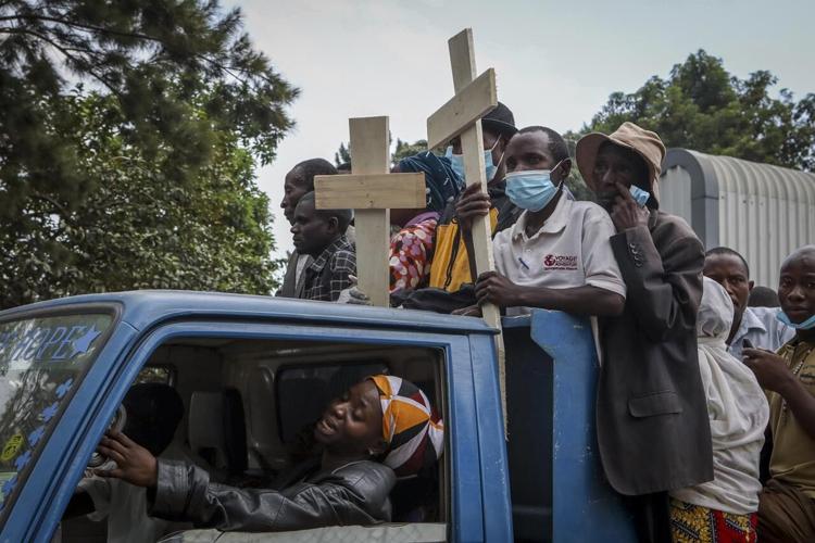 Ugandan border town buries victims of rebel massacre that left 42 dead ...