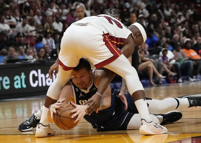 Butler has 35, Miami gets needed win over Dallas, 129-122