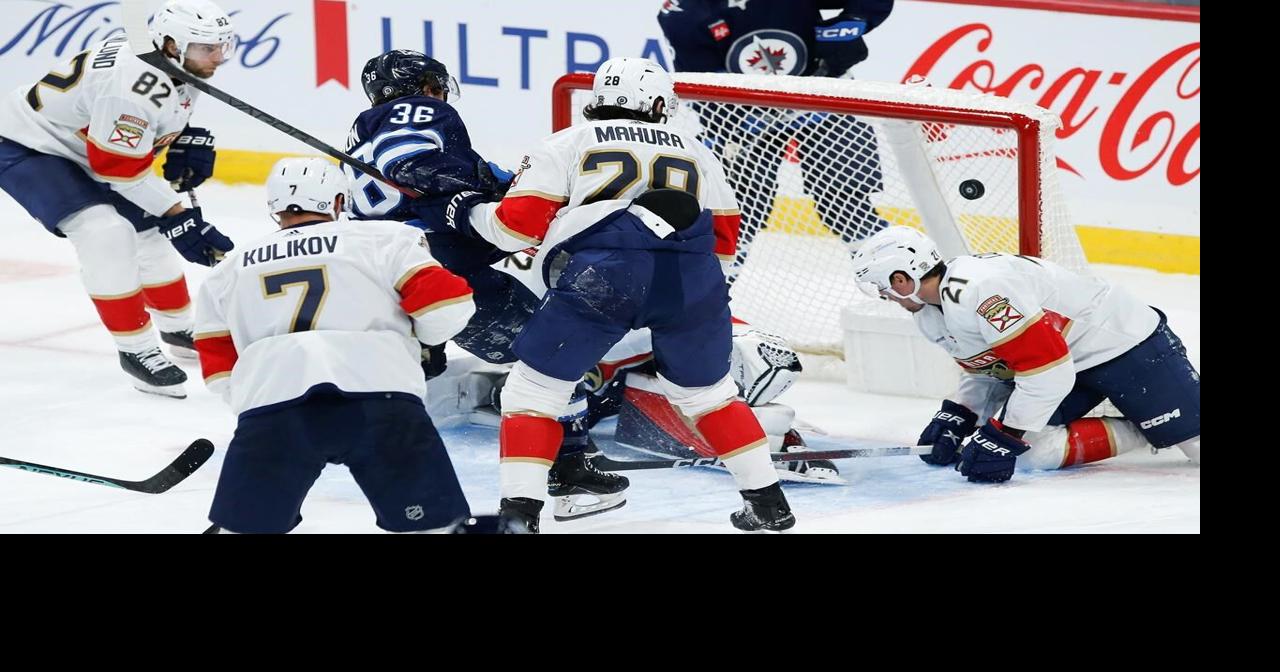 Connor scores twice, adds assist as Jets win home opener 6-4 over Panthers