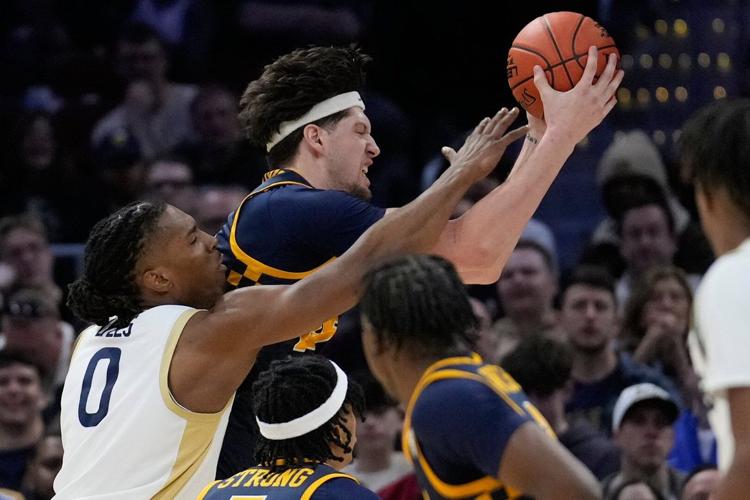 Scott's deep 3-point bomb sends Akron past Toledo, 79-76 for 3rd ...