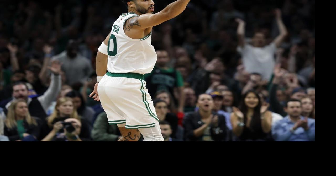 Tatum scores 36, Celtics rally to hold off Bulls 123-119