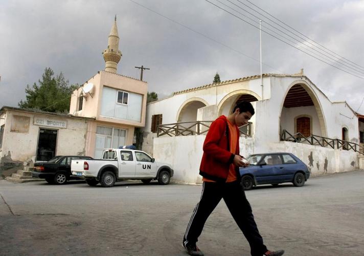 Turkish Cypriots attack UN peacekeepers trying to halt road work inside ...
