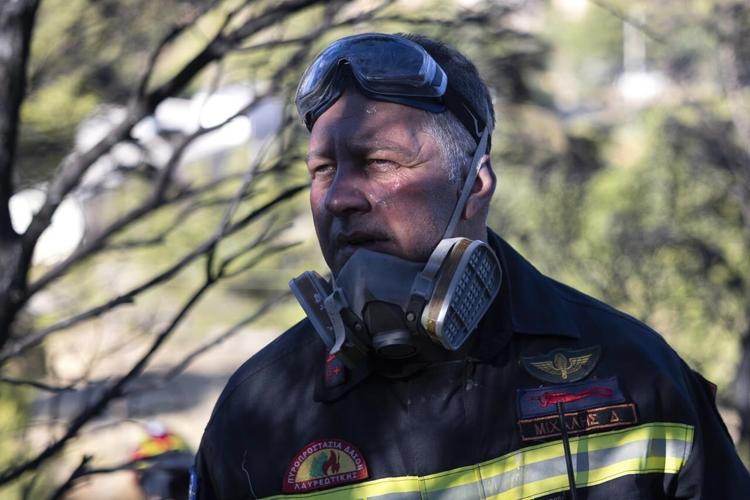 Firefighters battle wildfires on 2 Greek islands as premier warns of a ...