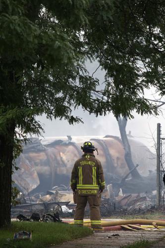 Cooling the tanks, not dousing flames, key to controlling fire ...