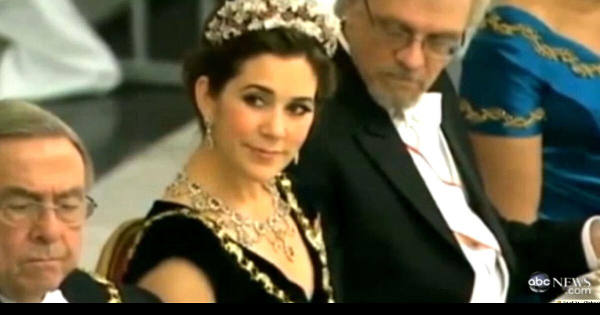 Busted! Finnish president's husband caught gazing down princess's dress
