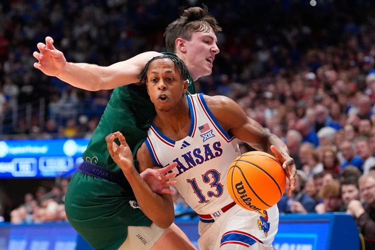 Peterson scores 21 points in 22 minutes in debut to lead No. 19 Kansas ...