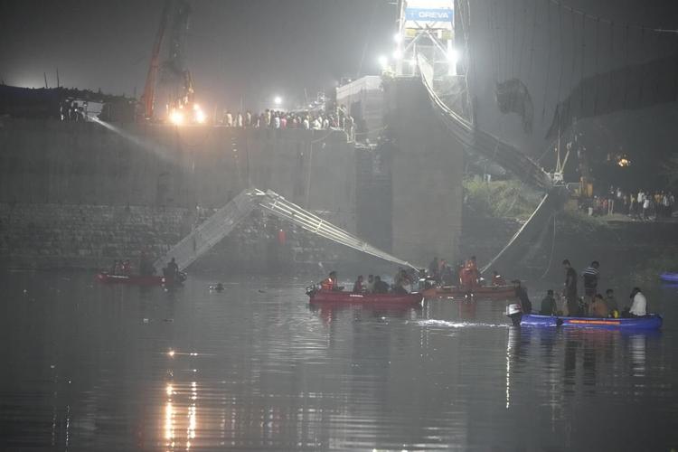 Suspension bridge collapse kills at least 132 in India