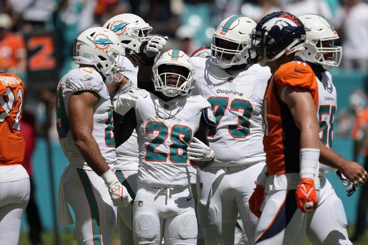 Dolphins rout Broncos 70-20, scoring the most points by an NFL team in ...