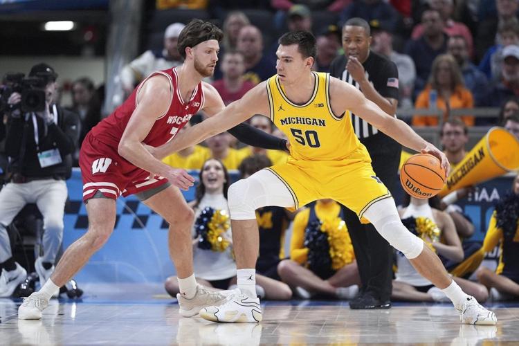 Michigan's Goldin is reunited with parents from Russia, hopes to show ...