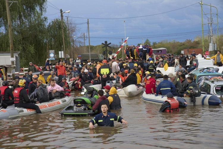 AP PHOTOS: Heavy rainfall floods Argentine highways, forces evacuations