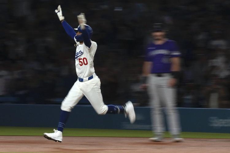 Dodgers open 2-game lead in NL West with 7-2 win over Rockies