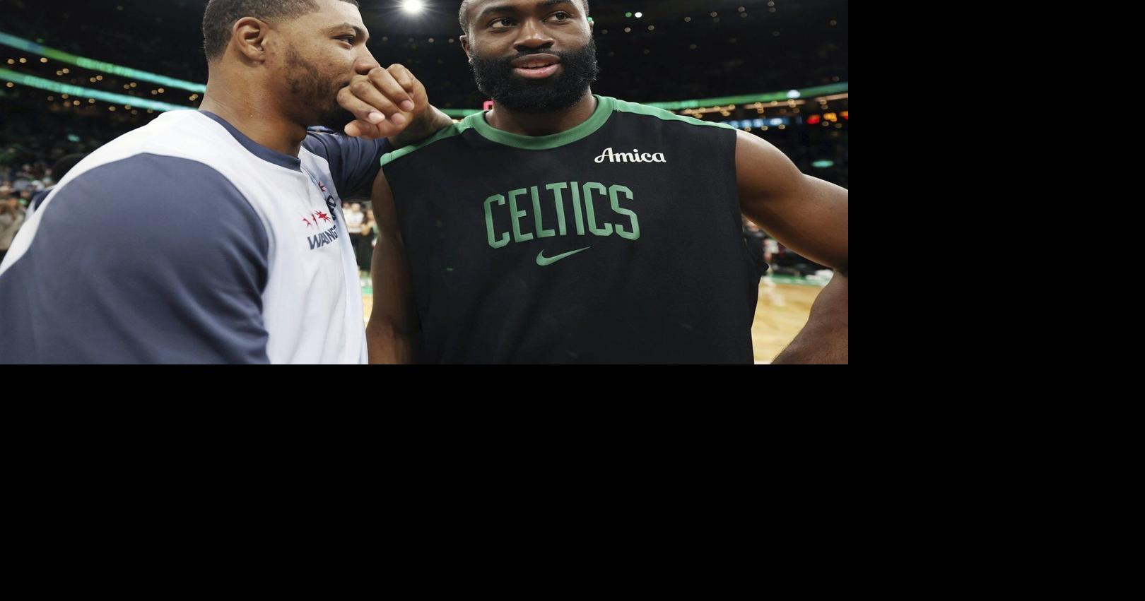 Marcus Smart gets in shouting match with a fan in his return to Boston ...