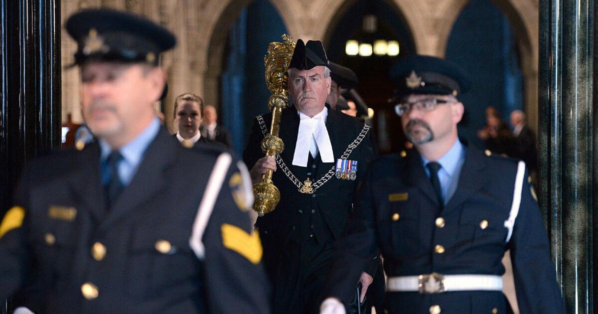 A day after a gunman’s attack, defiant MPs return to Parliament