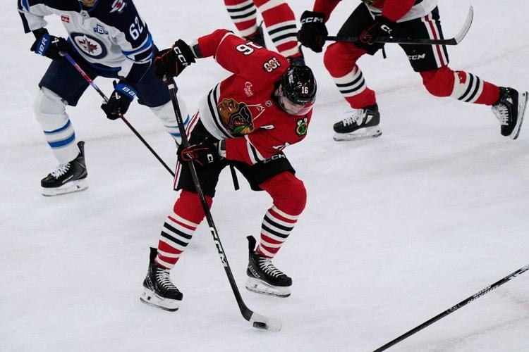 Knight makes 32 saves, Blackhawks blank Jets 2-0 to spoil Toews' return ...