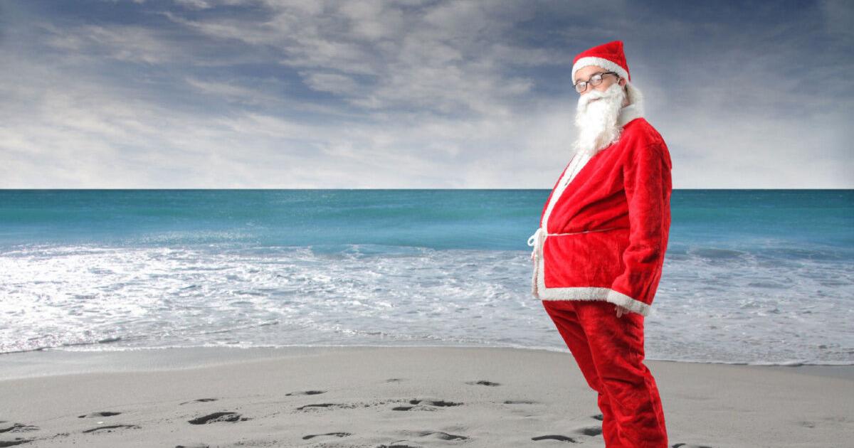 Global warming Santa travels on a sleigh with pontoons