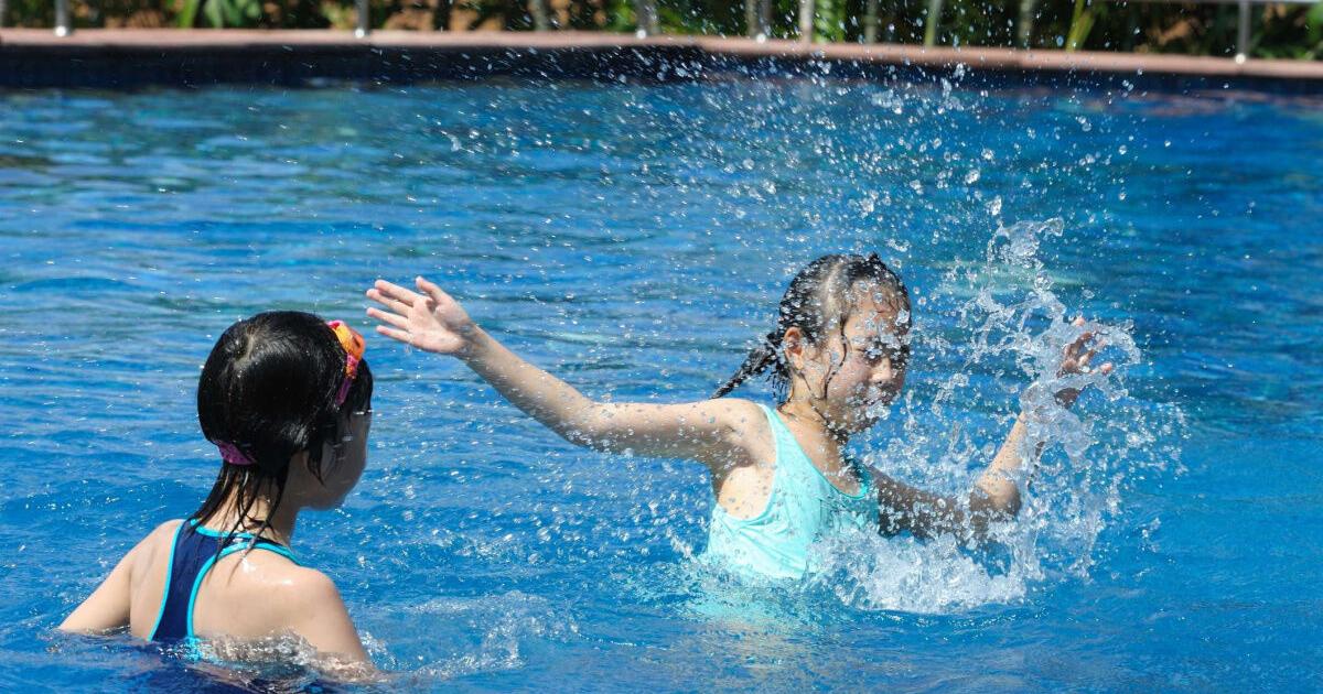 Open hours for swimming puts damper on their pool