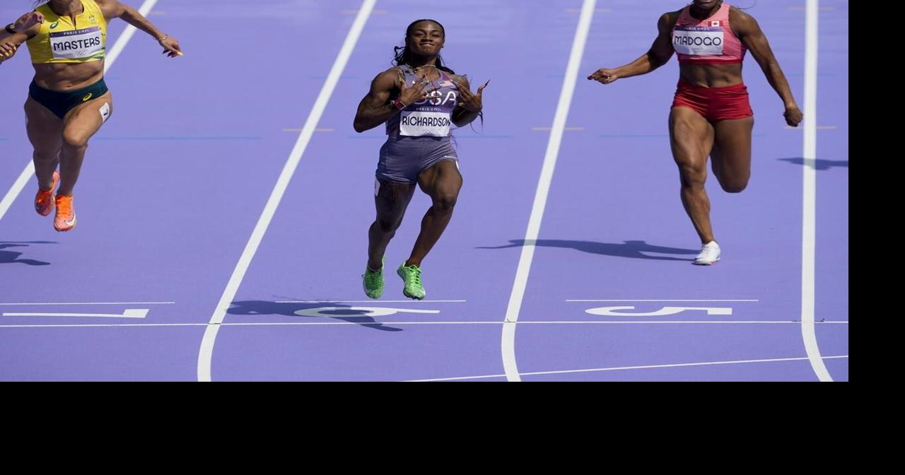 Sha'Carri breezes through opening round at her first Olympic race, wins ...