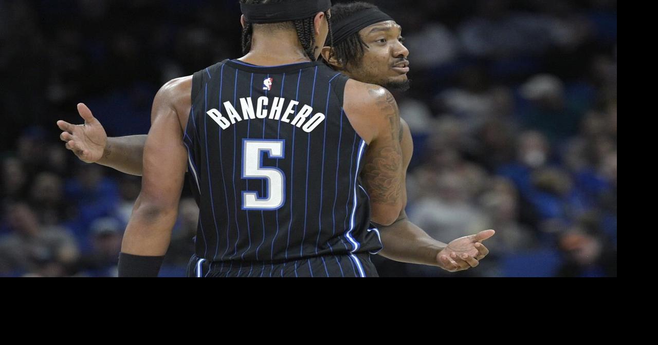 Sam Merrill scores 26, Cavs ease past Magic 126-99 for 8th straight win