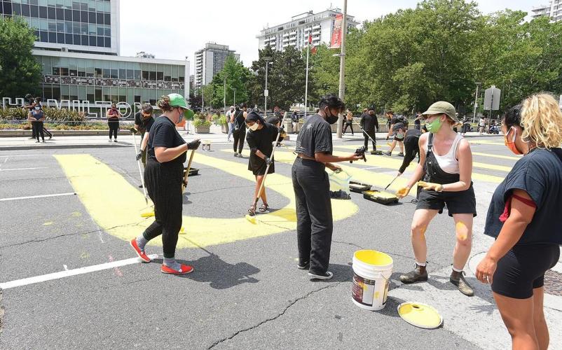 ‘Defund the police’ painted outside Hamilton city hall as activists ...