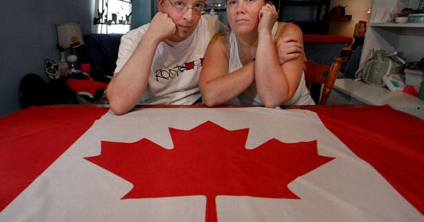 Couple forced to take down Canadian flag