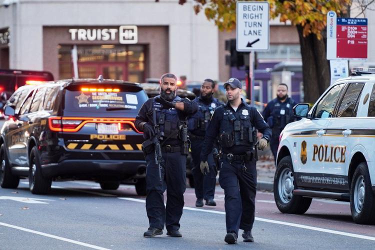 Photos from the scene where 2 National Guard members were shot near the ...