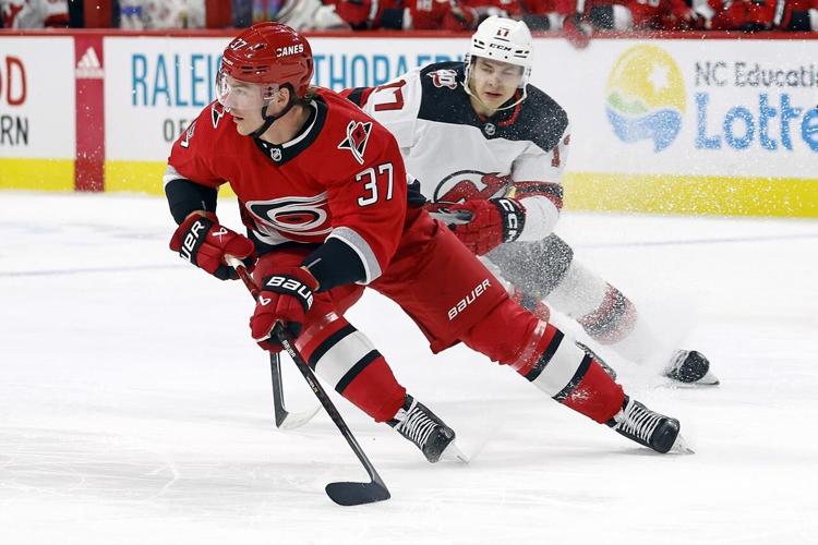 Canes beat Devils, move into 1st in Metropolitan Division