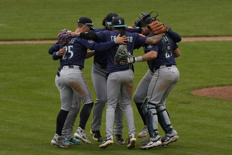 Arozarena, Mariners rally past Reds for 11-7 win in 10 innings